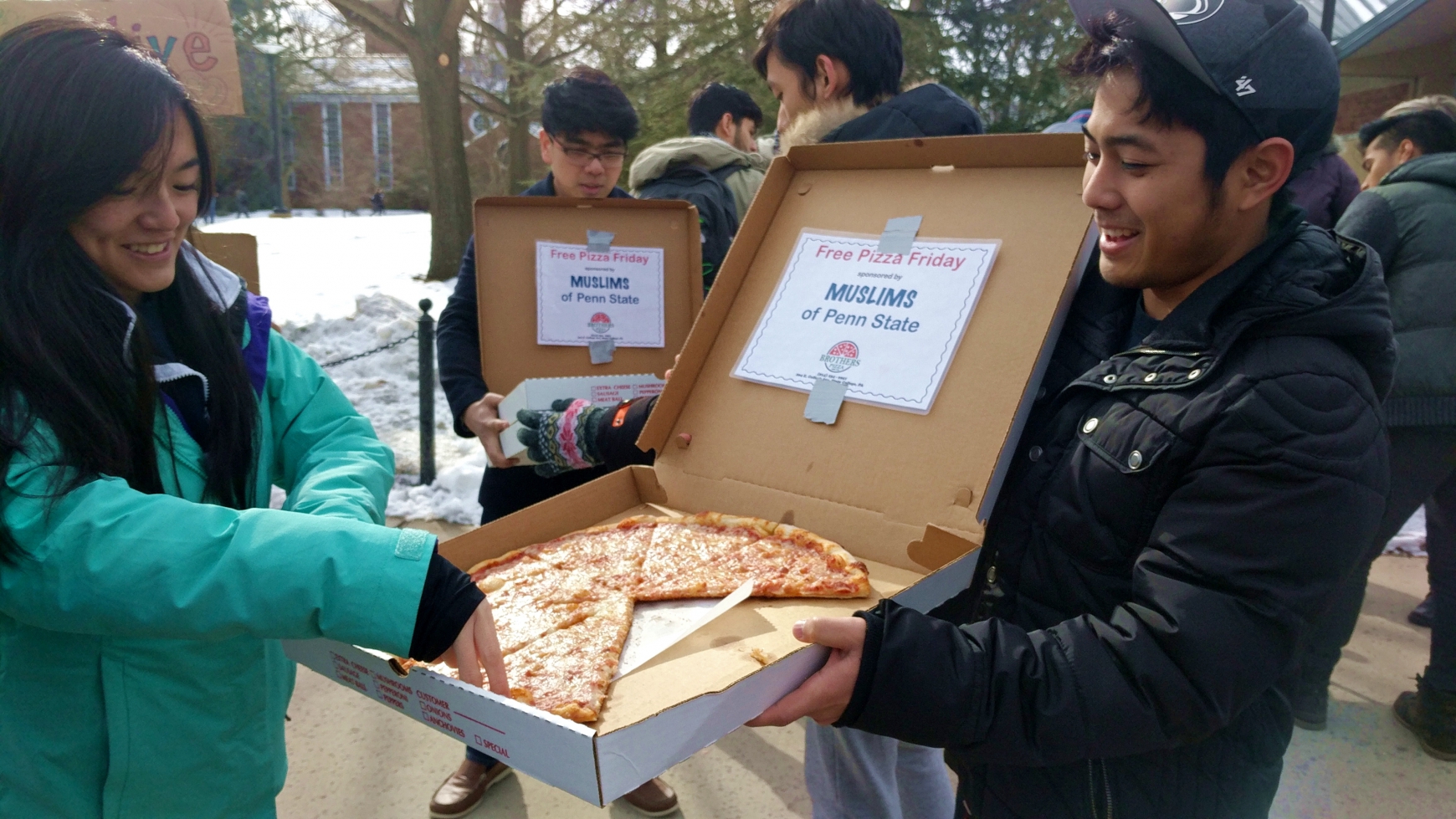 Muslim And Christian Students Unite Community With Free Pizza